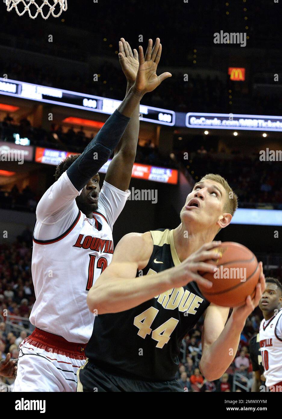 Purdue's Isaac Haas (44) looks to take a shot over the defense of ...