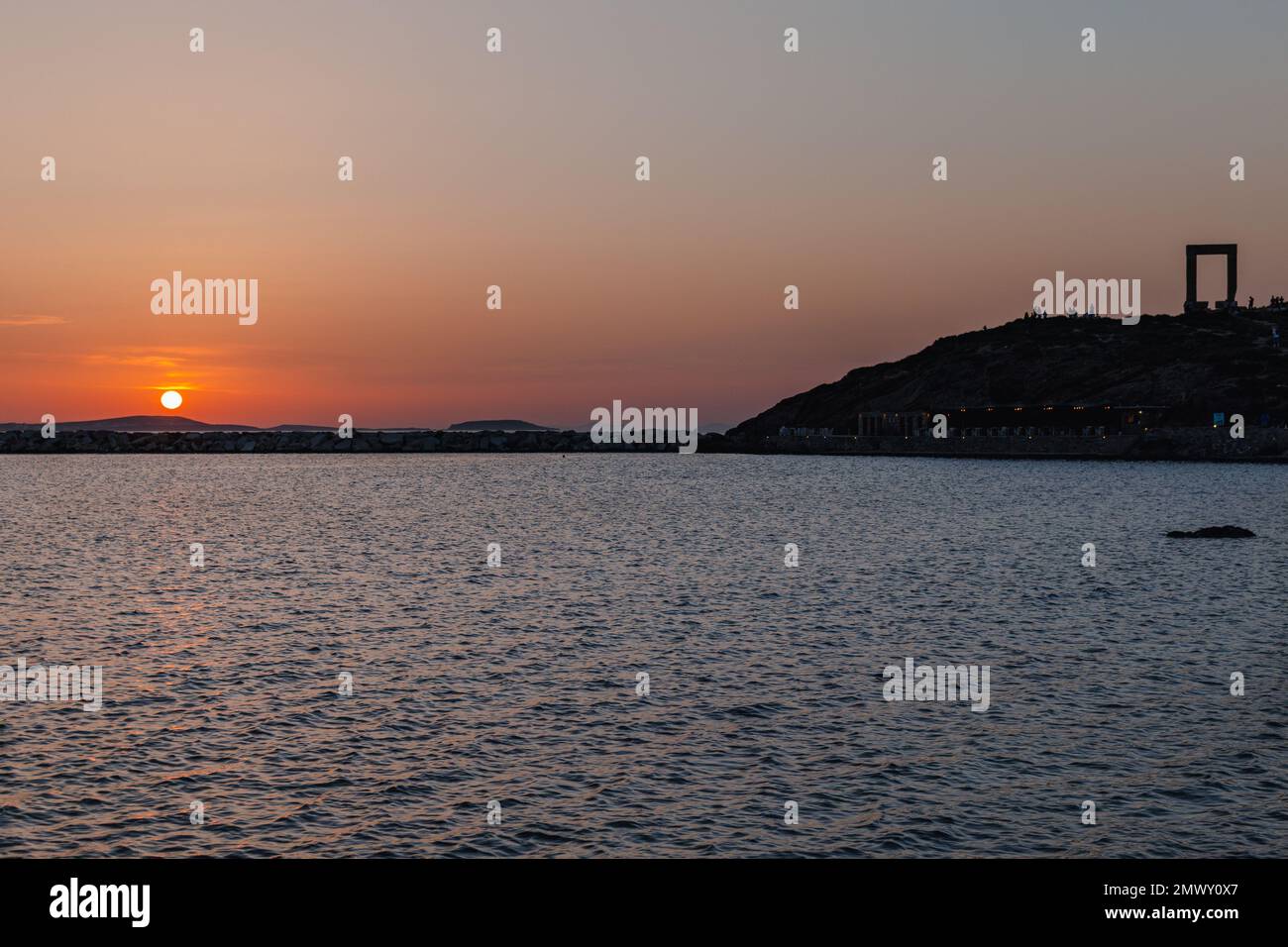 Naxos Portara also called Temple of Apollo at sunset Stock Photo - Alamy