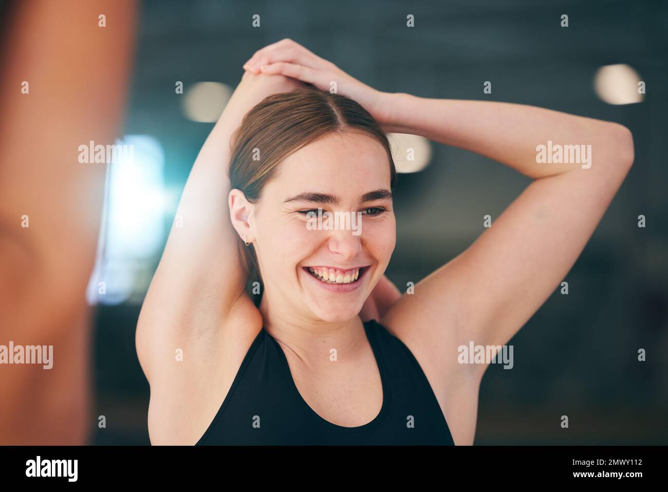 Woman stretching, exercise and swimmer arm, athlete smile and start ...