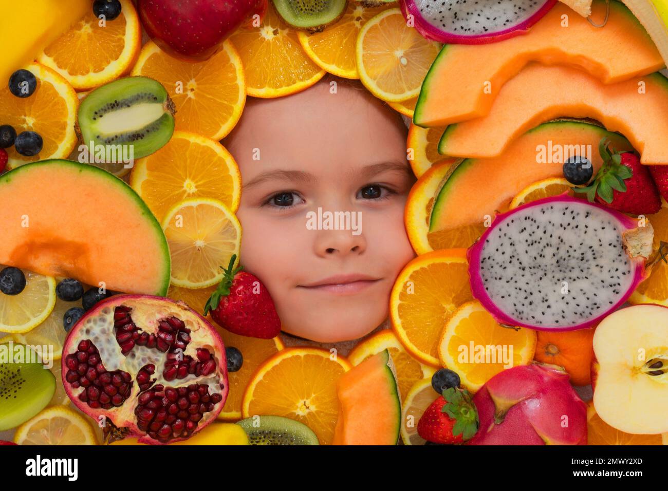 Top view of cute kids face with different fruits. Summer fruits. Kids ...