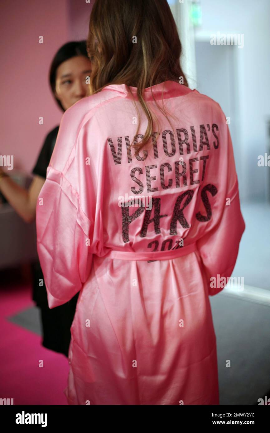A model wears a robe on backstage before Victoria's Secret fashion show ...