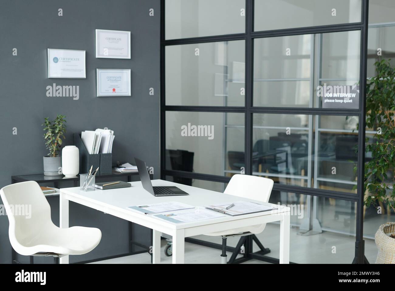 Horizontal image of workplace of manager with laptop and documents in ...