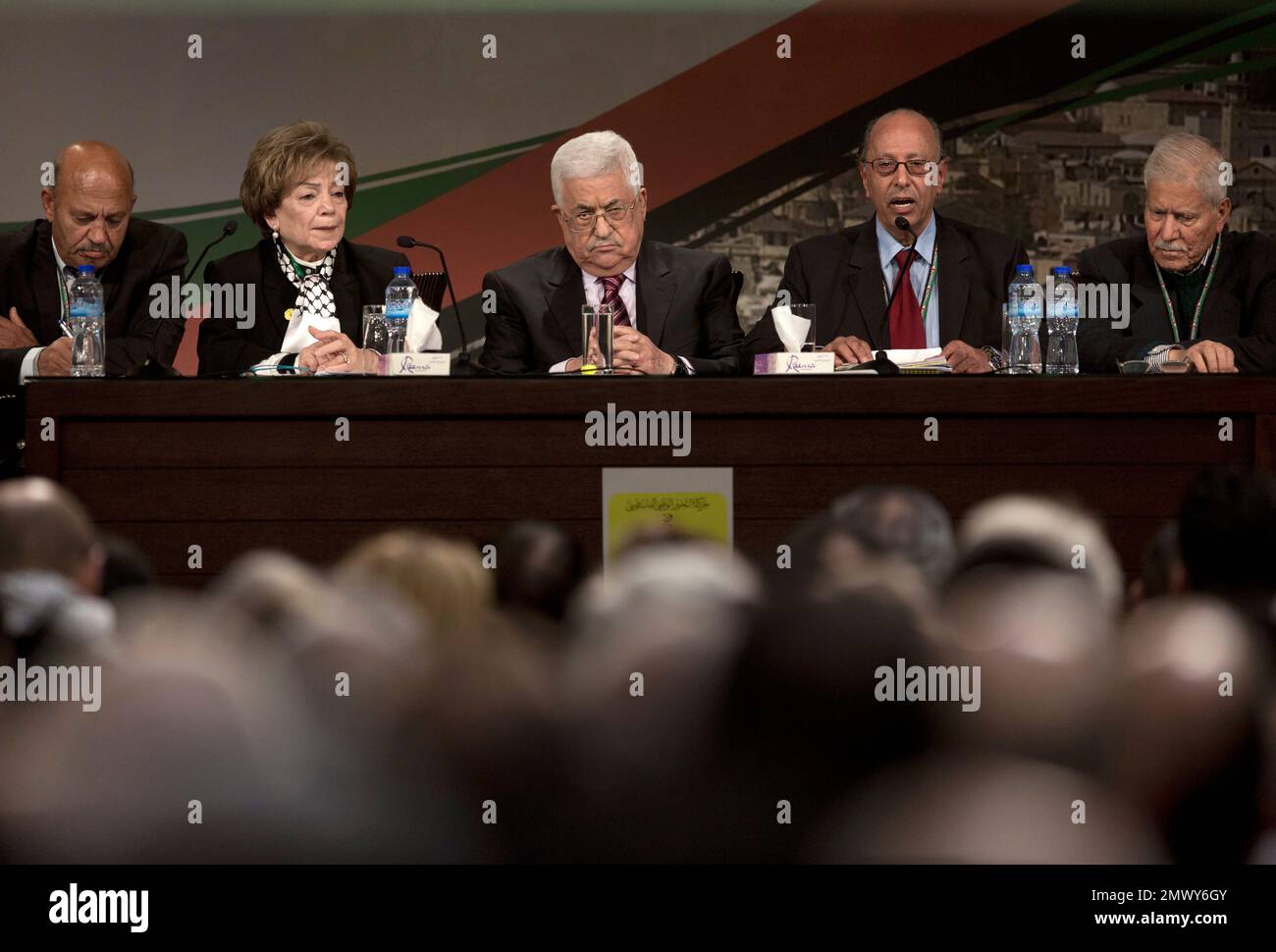 Palestinian President Mahmoud Abbas, center, attends the opening ...