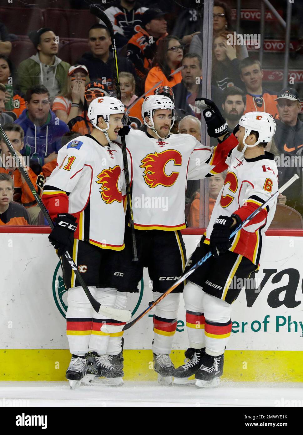 Calgary Flames' Mikael Backlund, from left, TJ Brodie and Dennis ...