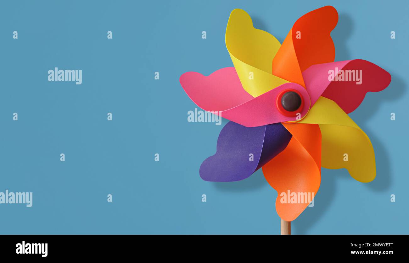 Colorful pinwheel isolated on the blue background with copy space Stock ...