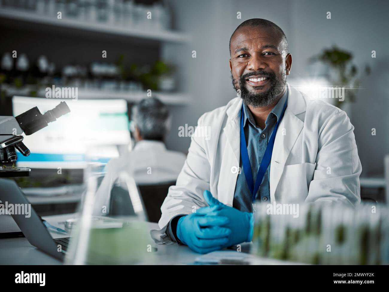 Scientist black man, portrait and lab with smile for research, plants ...