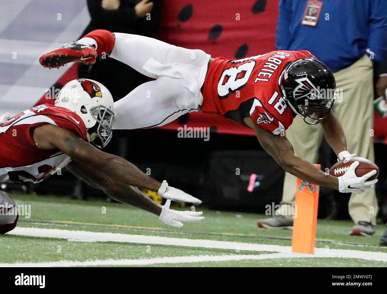 Atlanta Falcons wide receiver Taylor Gabriel (18) leaps into the end ...