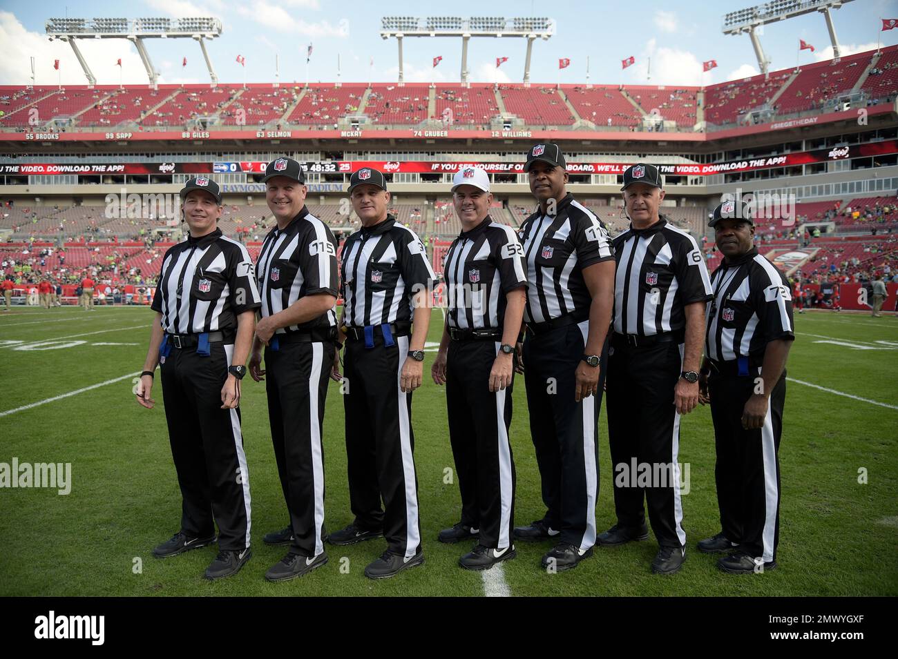 The officiating crew from left to right, back judge Greg Meyer (78 ...