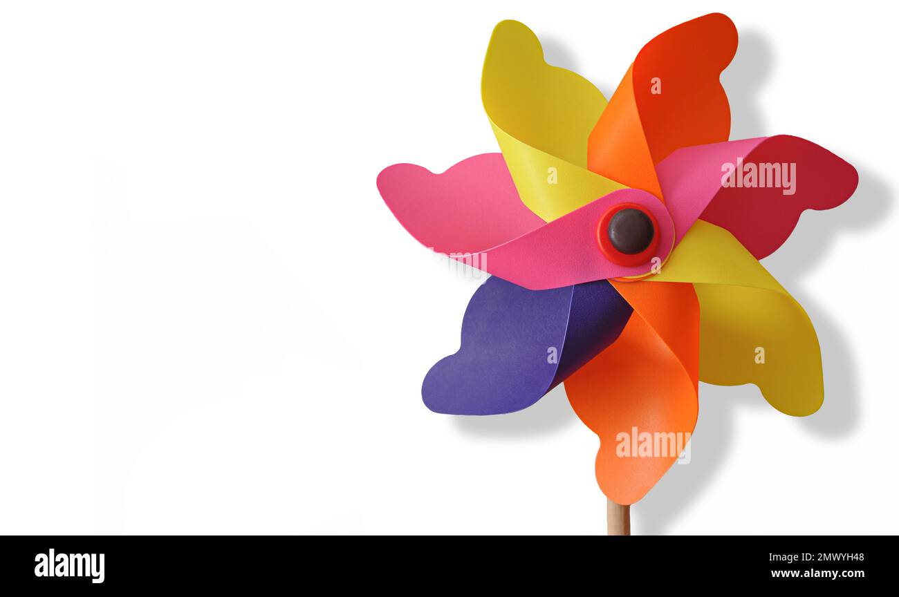 Flat lay Rainbow pinwheel on white background, copy space Stock Photo ...