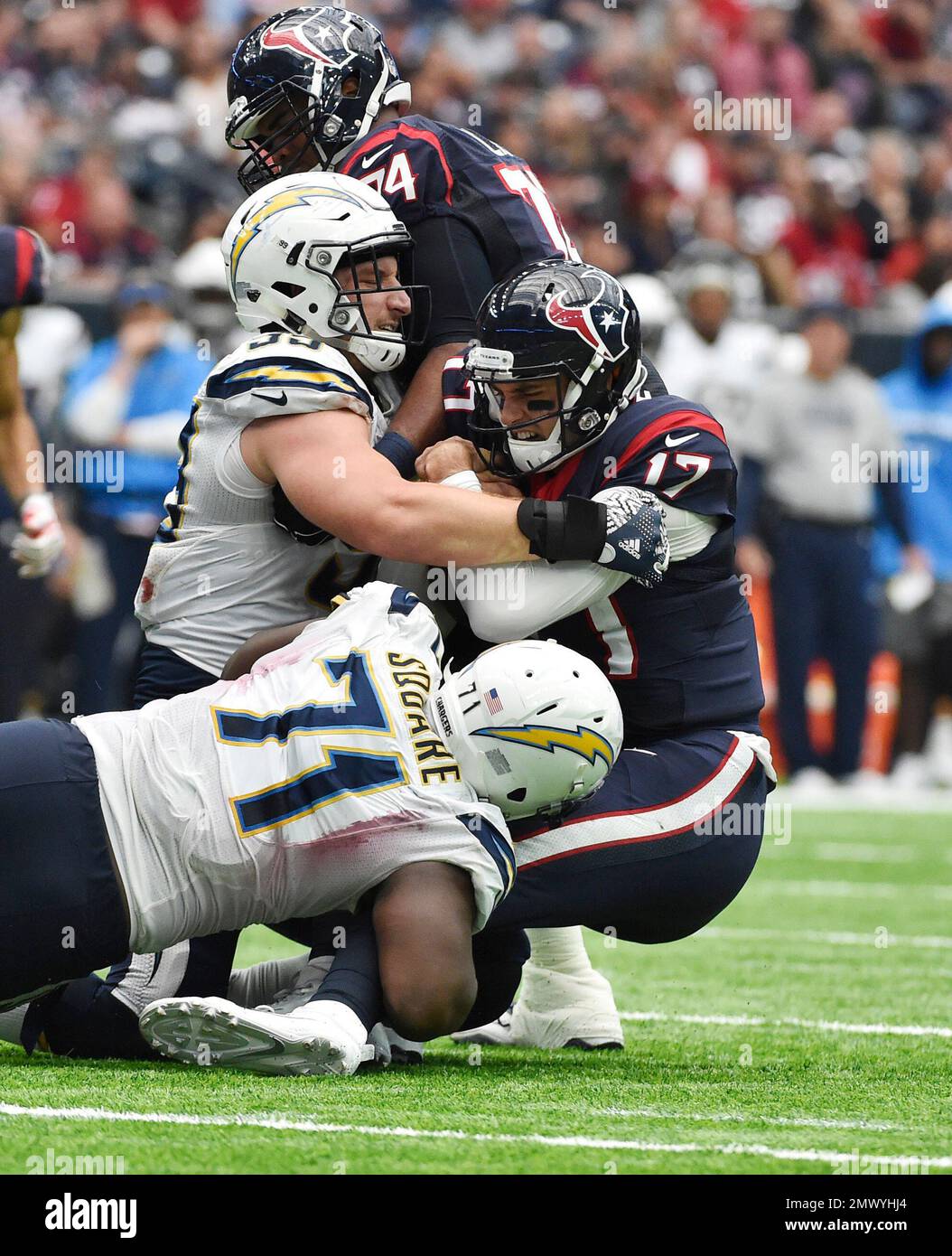 Houston Texans quarterback Brock Osweiler (17) is sacked by San Diego ...