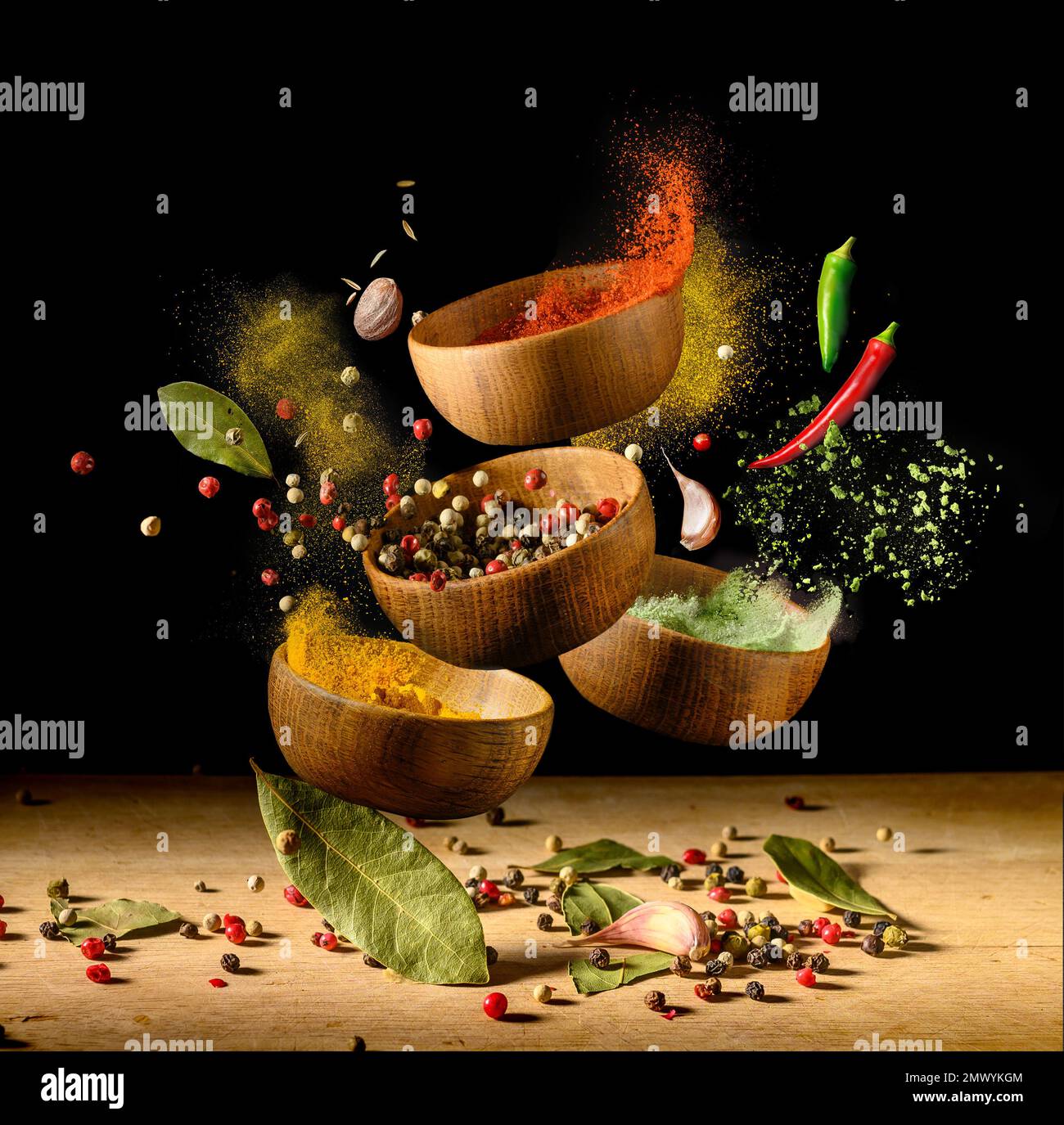 Spices and seasonings powder splash, explosion on black Stock Photo - Alamy