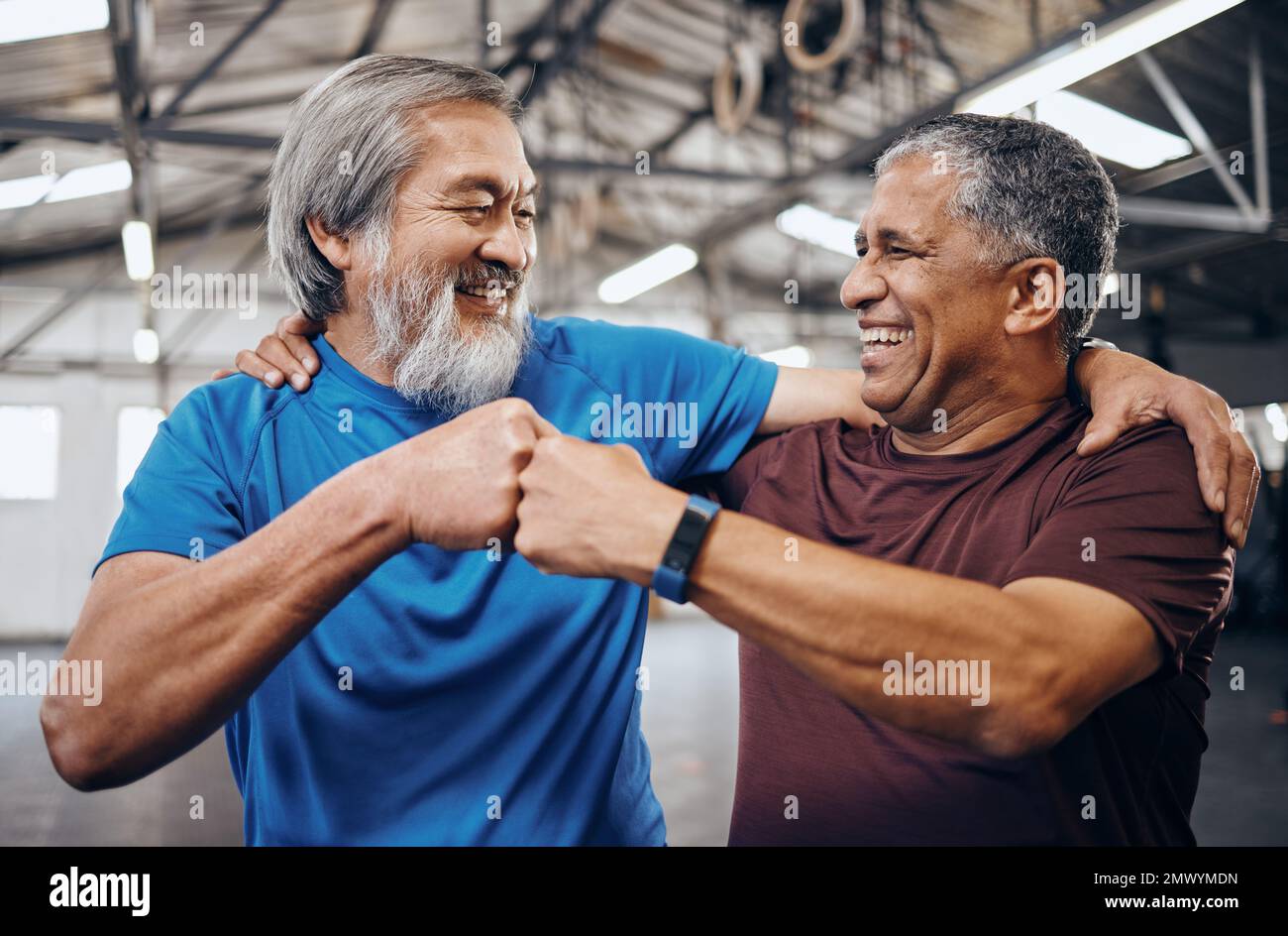 Men, gym and training with fist bump, smile and teamwork motivation for ...