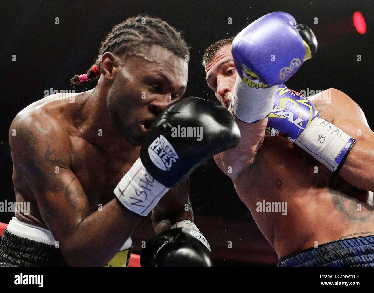 Vasyl Lomachenko, right, of Ukraine, fights Nicholas Walters, of ...