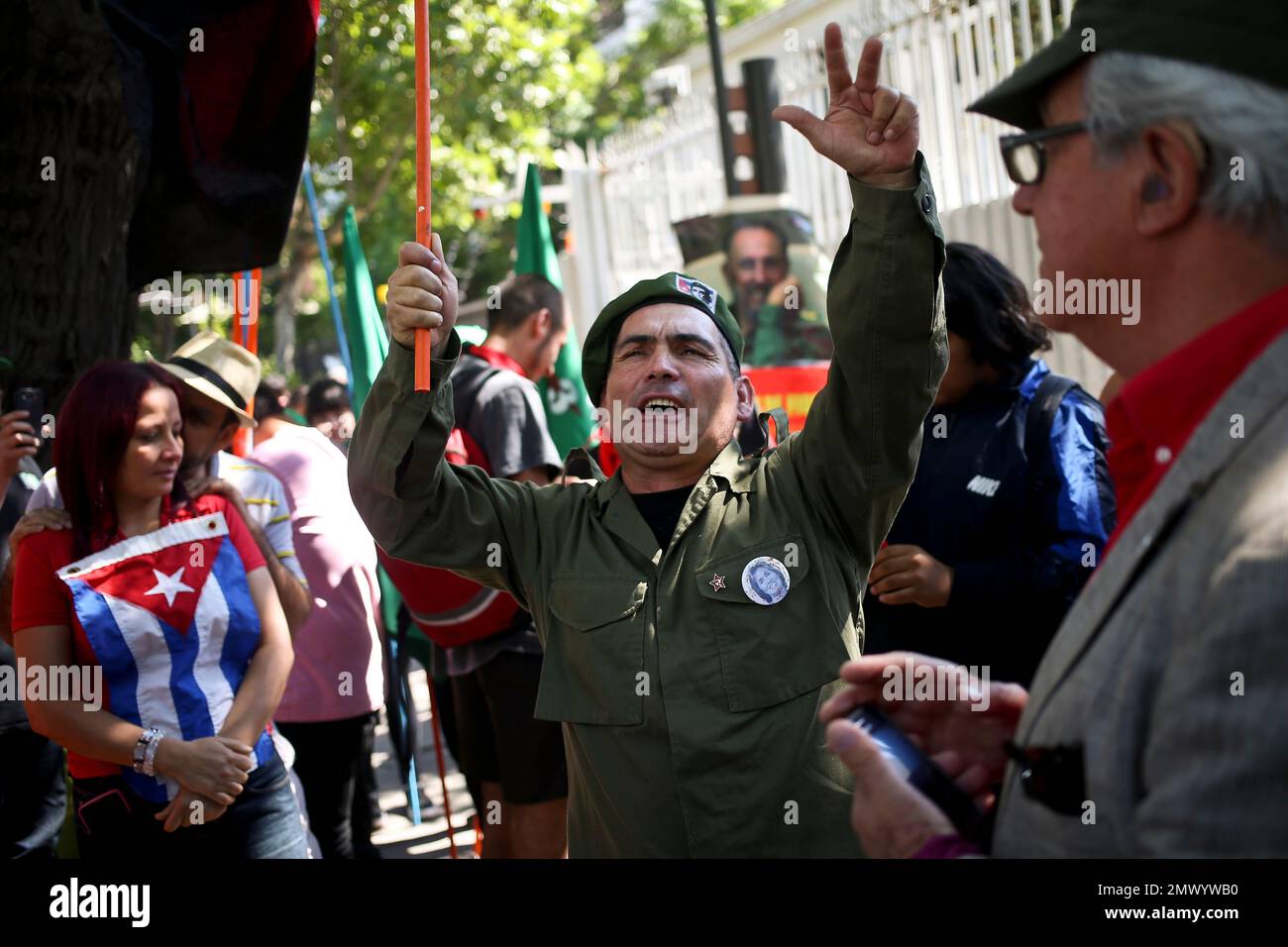 A man shouts slogans in favor of Fidel Castro outside Cuba's embassy in ...