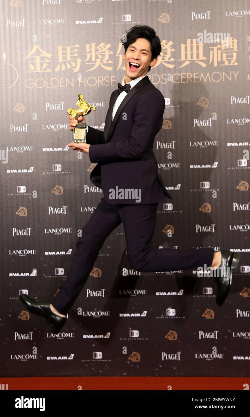 Taiwanese actor Lin Po-hung holds his award for Best Supporting Actor at the 53rd Golden Horse ...