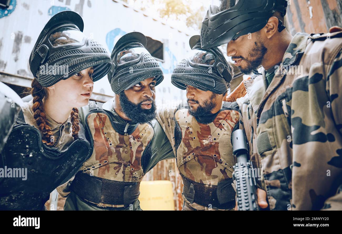 Diversity team, paintball and planning strategy together with friends ...