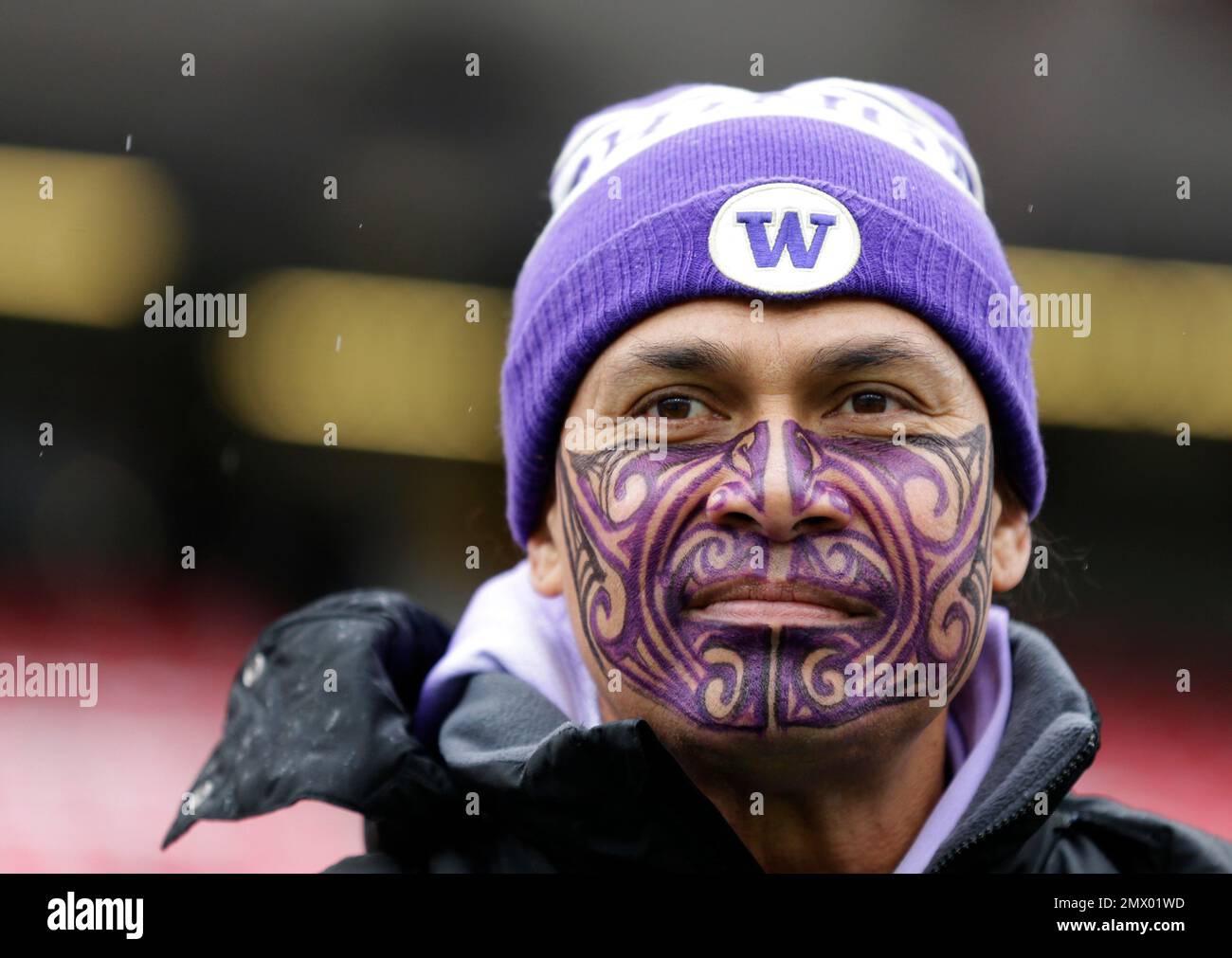 Luki Wooching, the father of Washington linebacker Psalm Wooching ...