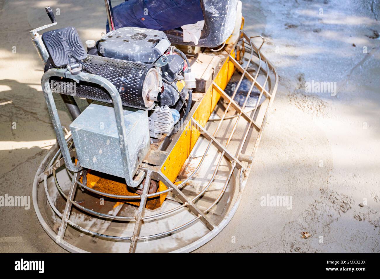Close-up of self-leveling power trowel machine, for smoothing surface ...