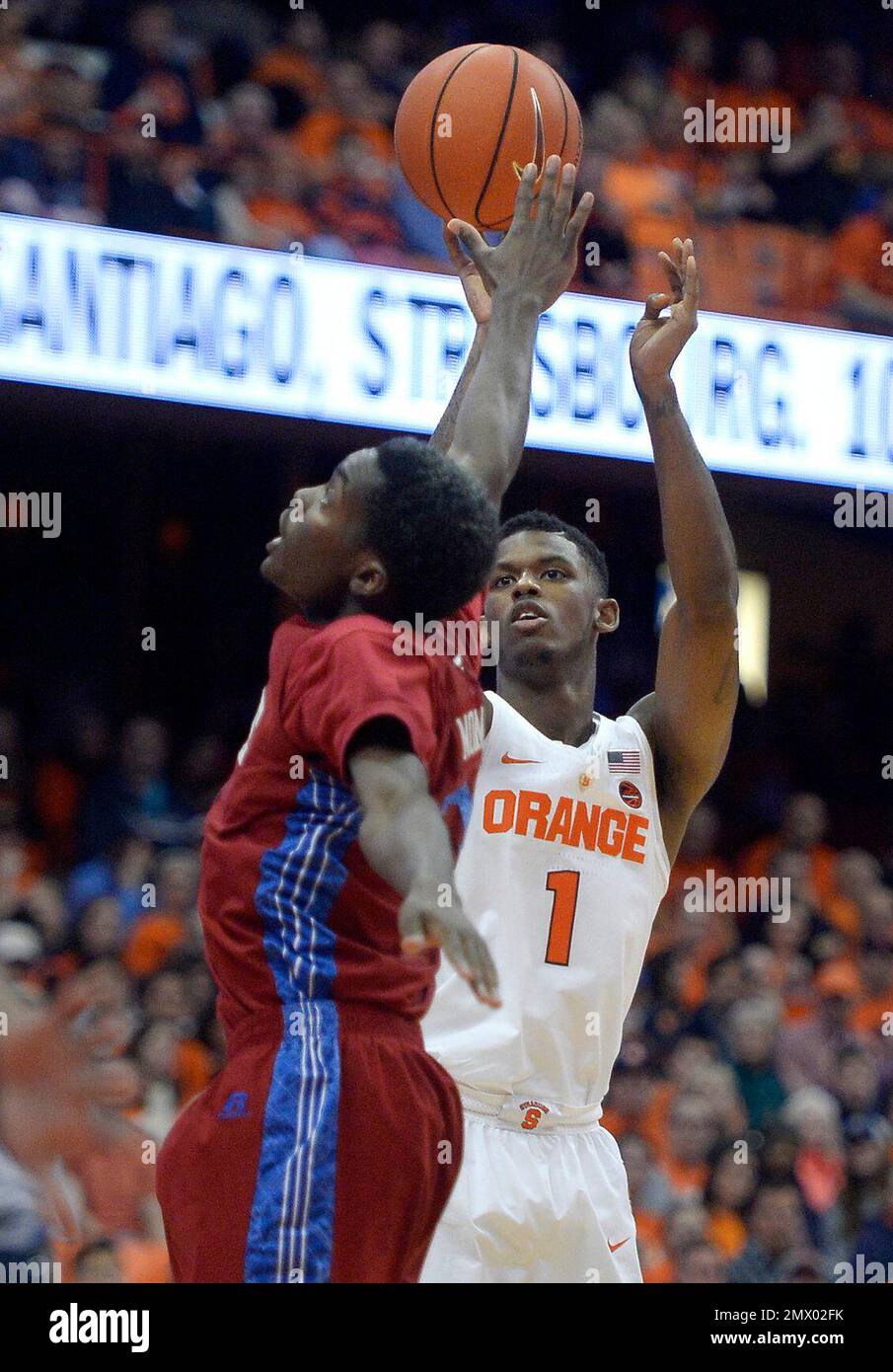 Syracuse’s Frank Howard shoots over South Carolina State’s Greg ...