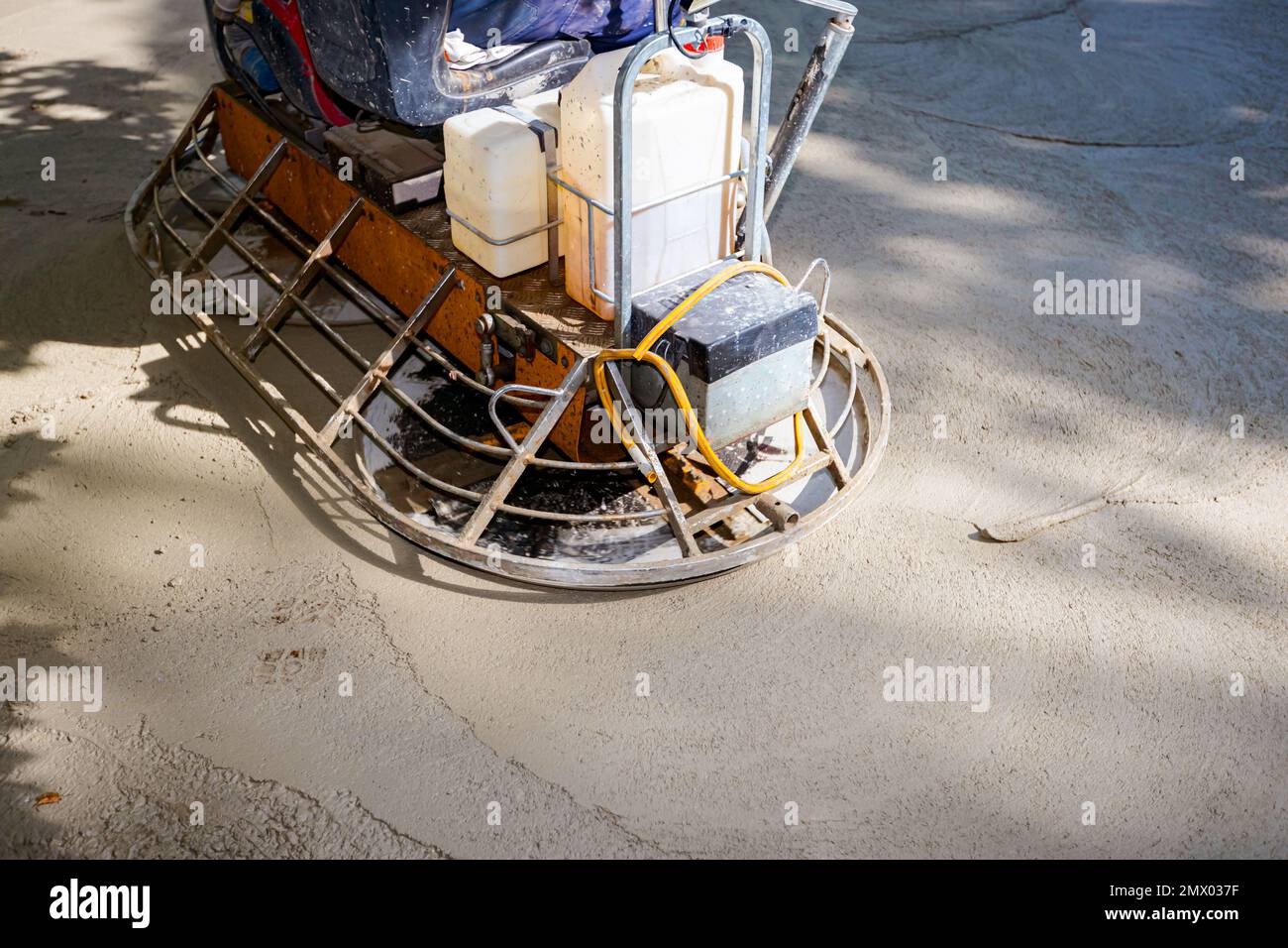Close-up of self-leveling power trowel machine, for smoothing surface ...