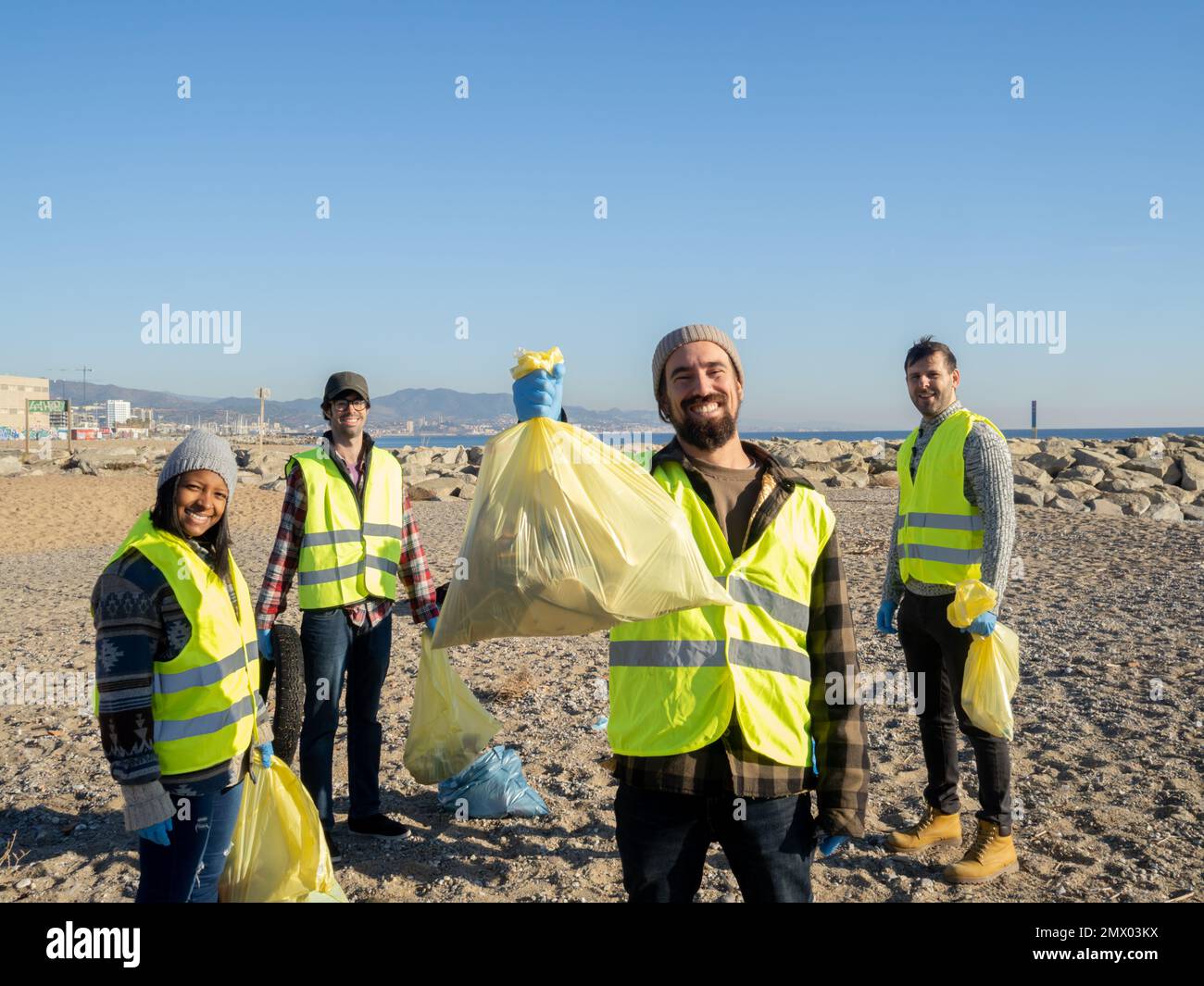 Collecting plastic garbage on beach hi-res stock photography and images ...