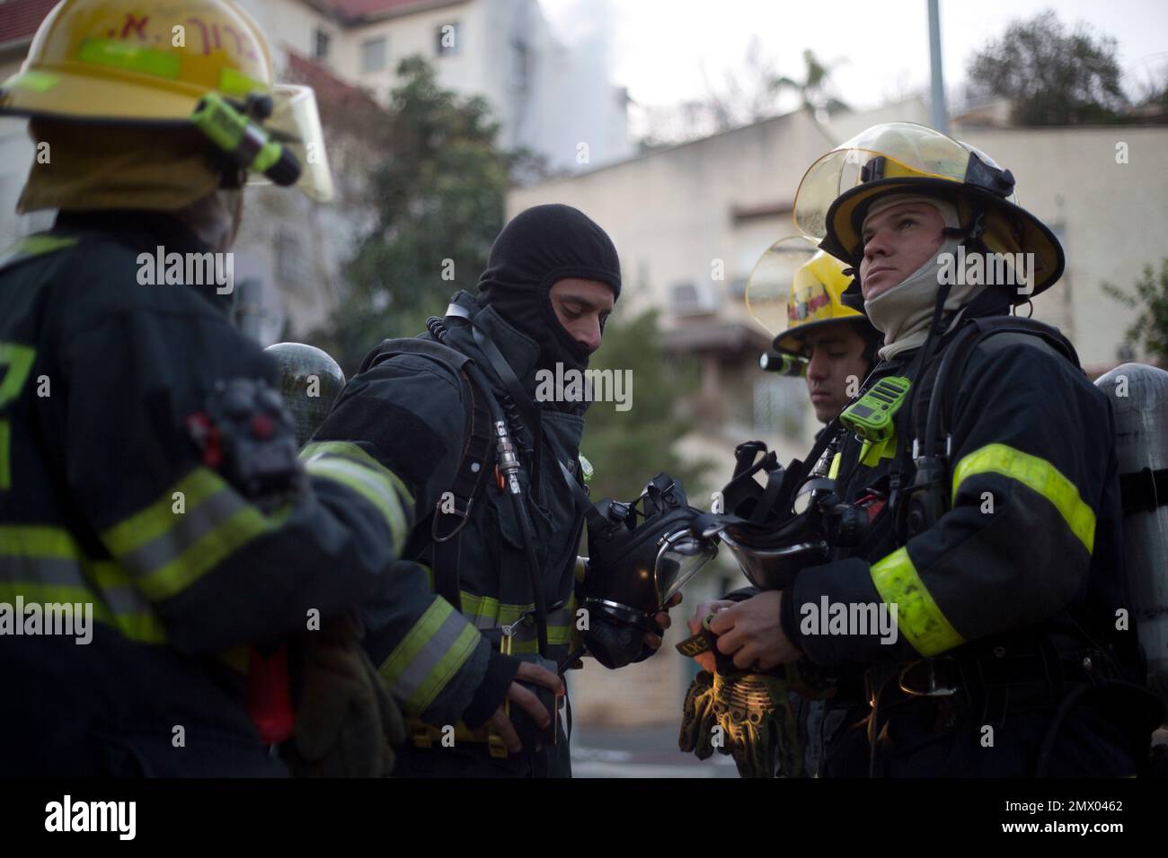 Israeli firefighters work in Haifa, Israel, Friday, Nov. 25, 2016 ...