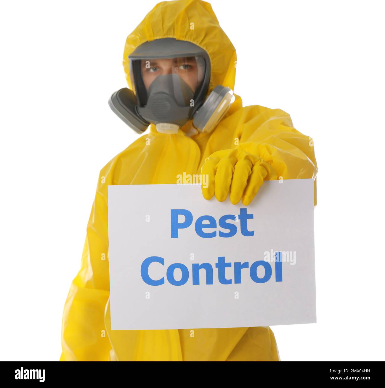 Man wearing protective suit holding sign PEST CONTROL on white ...