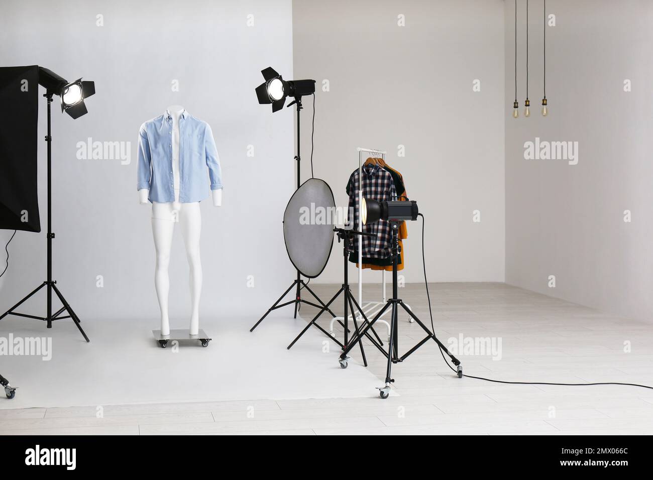 Ghost mannequin with modern clothes in professional photo studio Stock ...