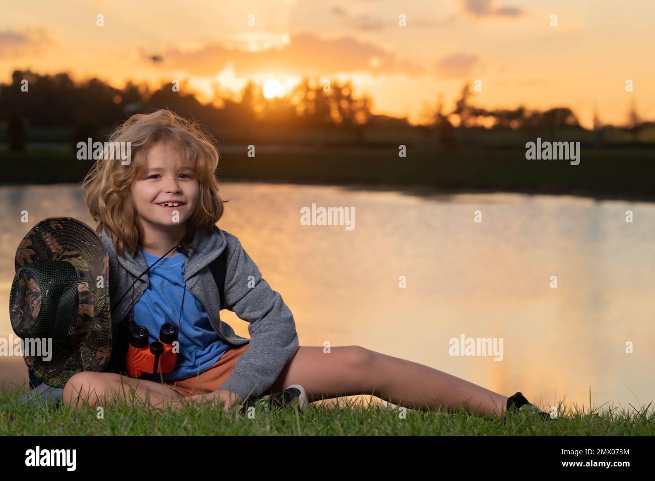 Dreams of discoveries. Child with backpack, traveller or explorer ...