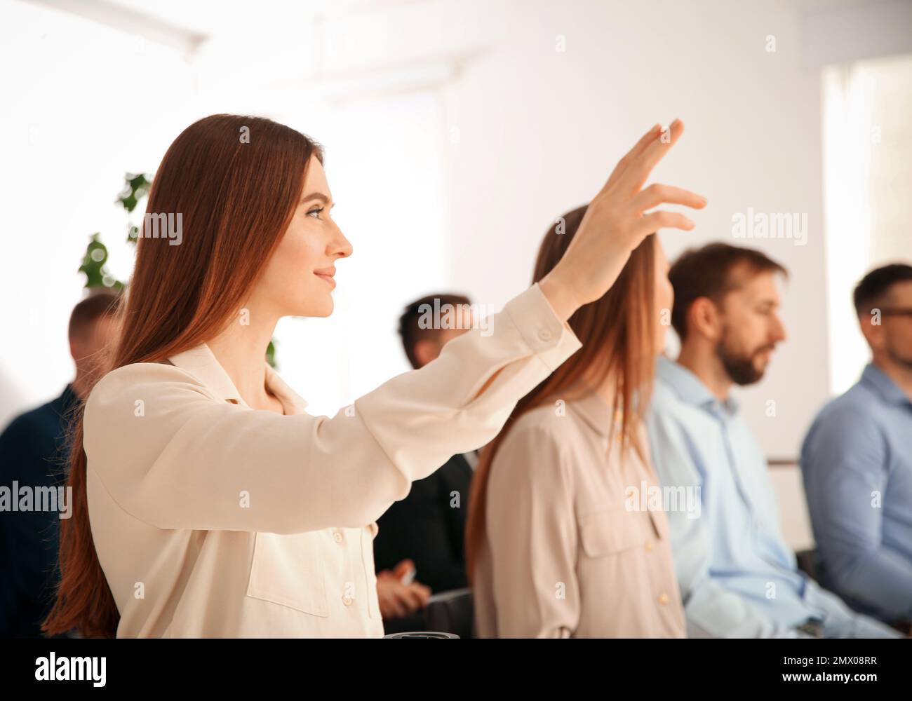 Woman raising hand question hi-res stock photography and images - Alamy