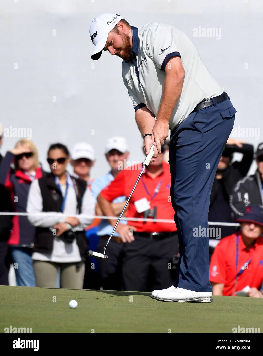 Ireland's Shane Lowry watches his putt on the 18th green during his ...