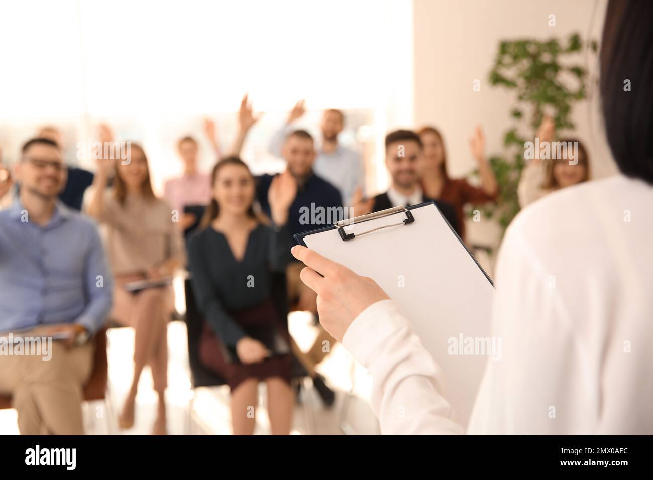 Audience answering questions speaker hi-res stock photography and ...