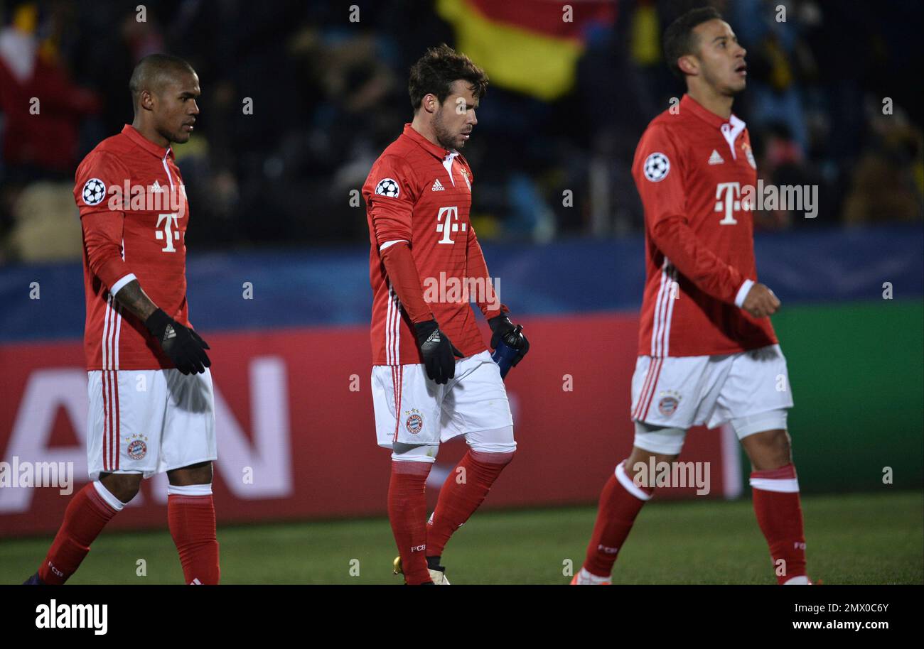 Bayern Munich's players leave the pitch after their team's 3-2 loss in ...