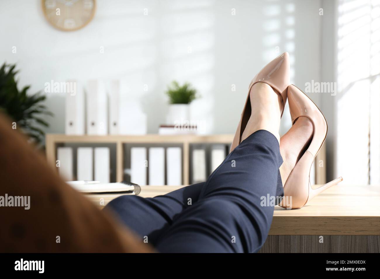 Feet on desk hi-res stock photography and images - Alamy