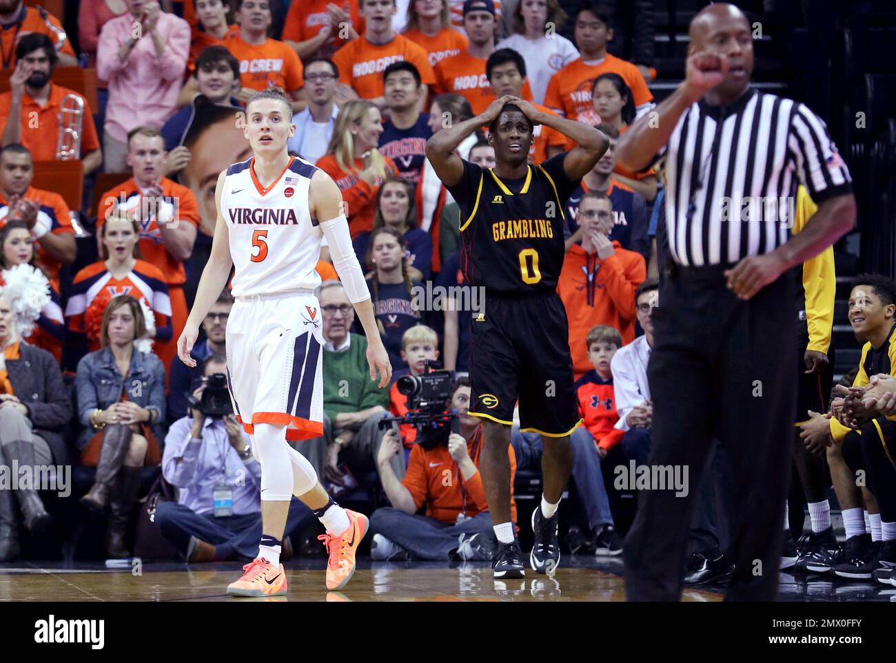 Grambling State guard Ervin Mitchell (0) reacts after fouling Virginia ...