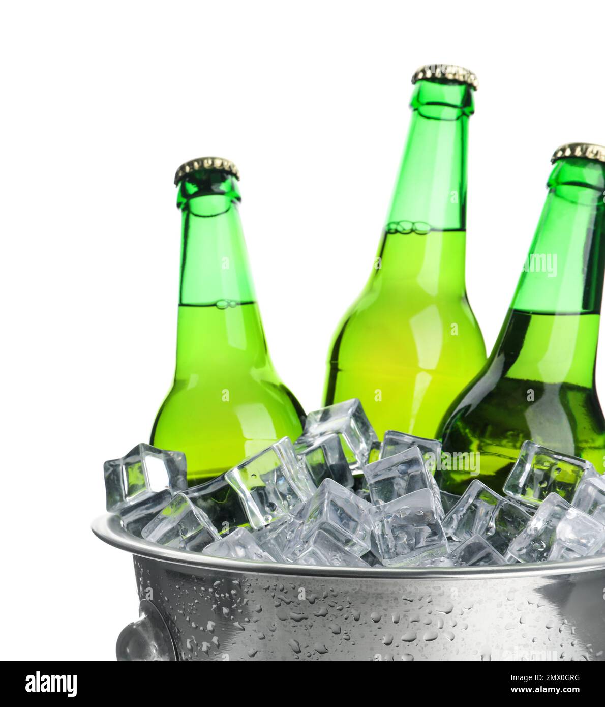 Metal bucket with bottles of beer and ice cubes isolated on white Stock ...