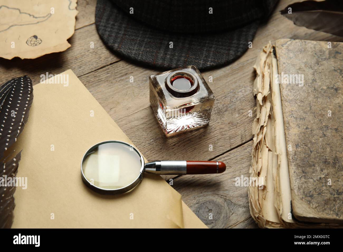 Composition with different vintage items on wooden table. Detective's ...