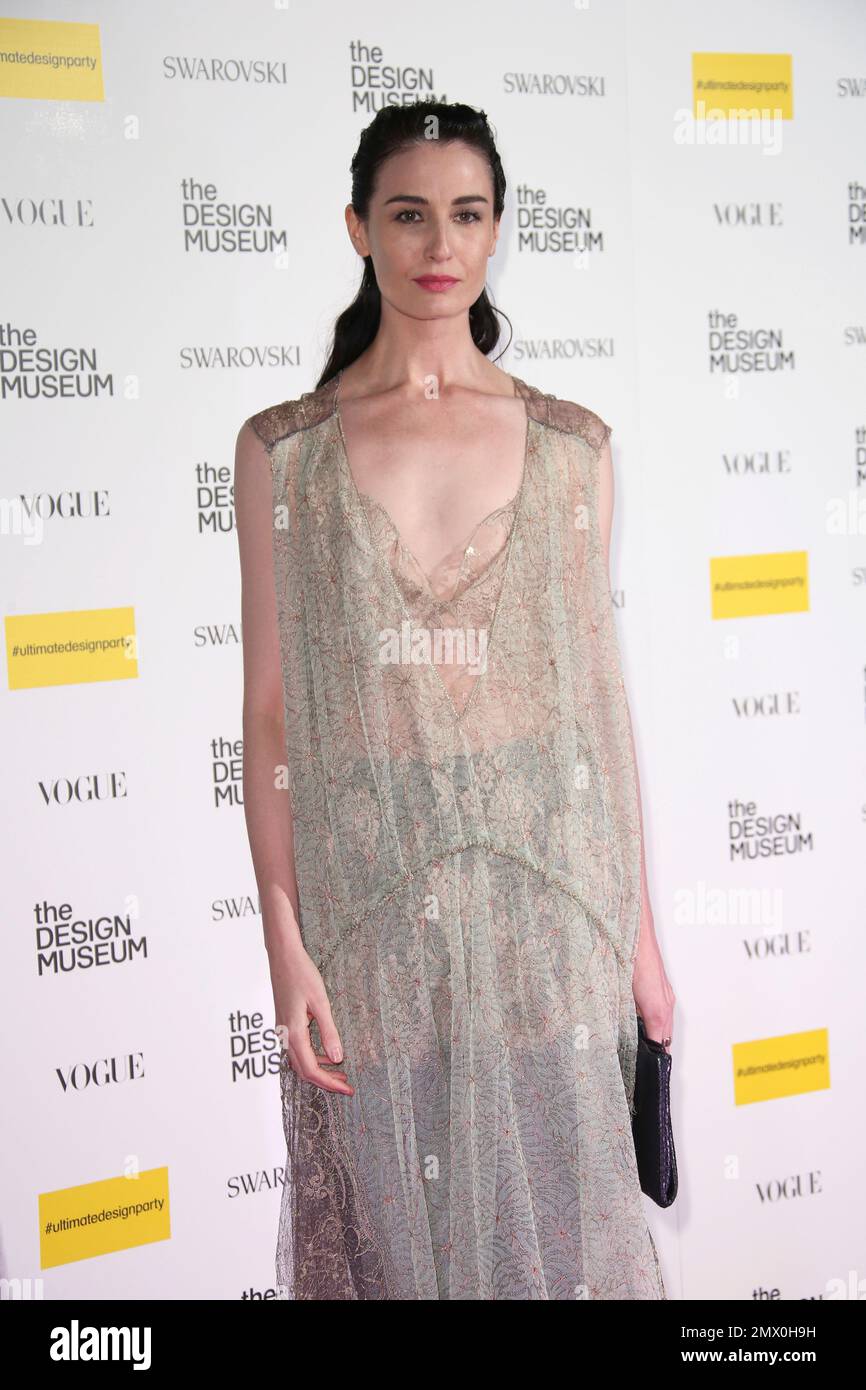 Model Erin O'Connor poses for photographers upon arrival at the Design ...