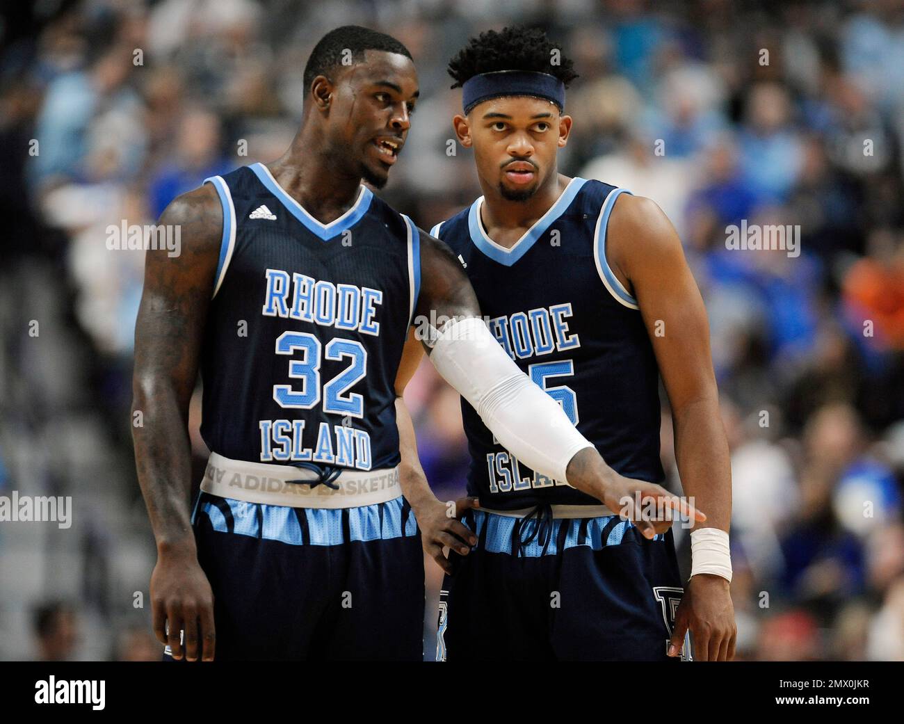Rhode Island’s Jared Terrell, left talks with Rhode Island’s Christion ...