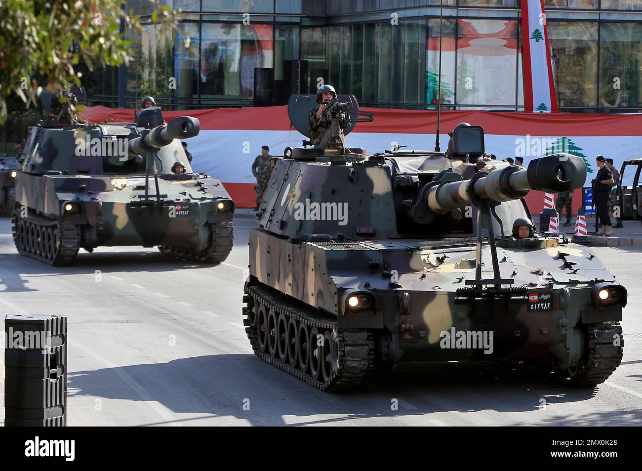 Lebanese army soldiers atop of their tanks during a military parade to ...