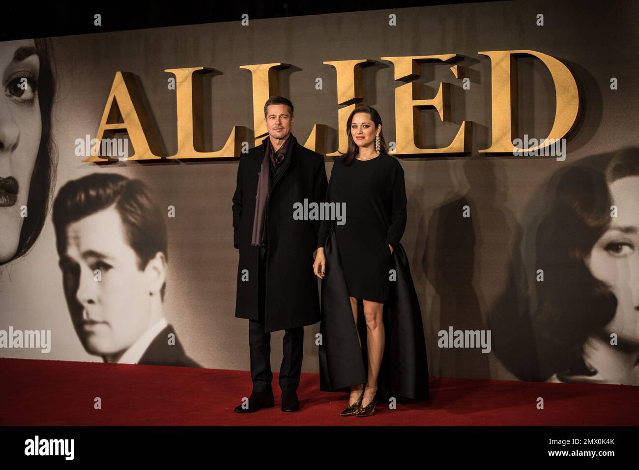 Brad Pitt and Marion Cotillard pose for photographers upon arrival at ...