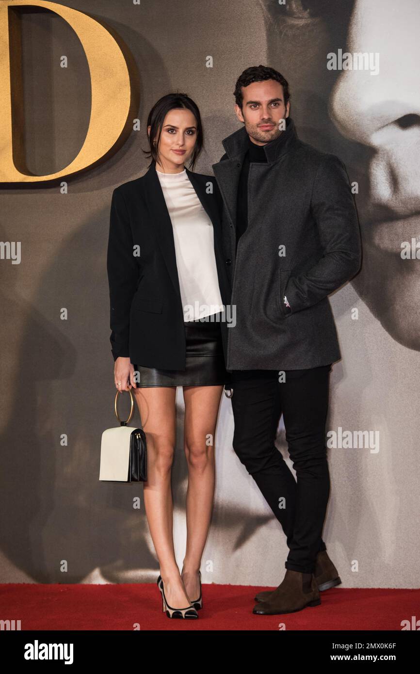 Lucy Watson and James Dunmore pose for photographers upon arrival at ...