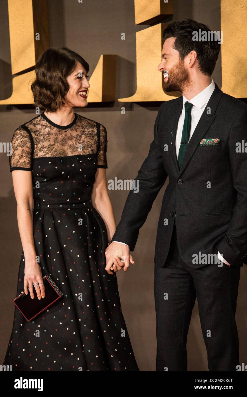 Lizzy Caplan and Tom Riley pose for photographers upon arrival at the ...