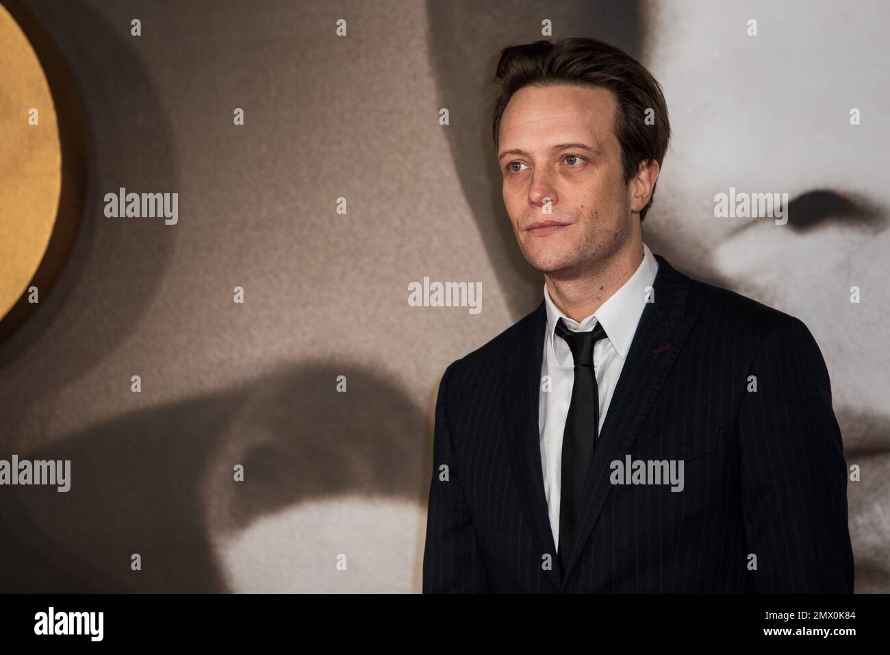 August Diehl poses for photographers upon arrival at the premiere of ...