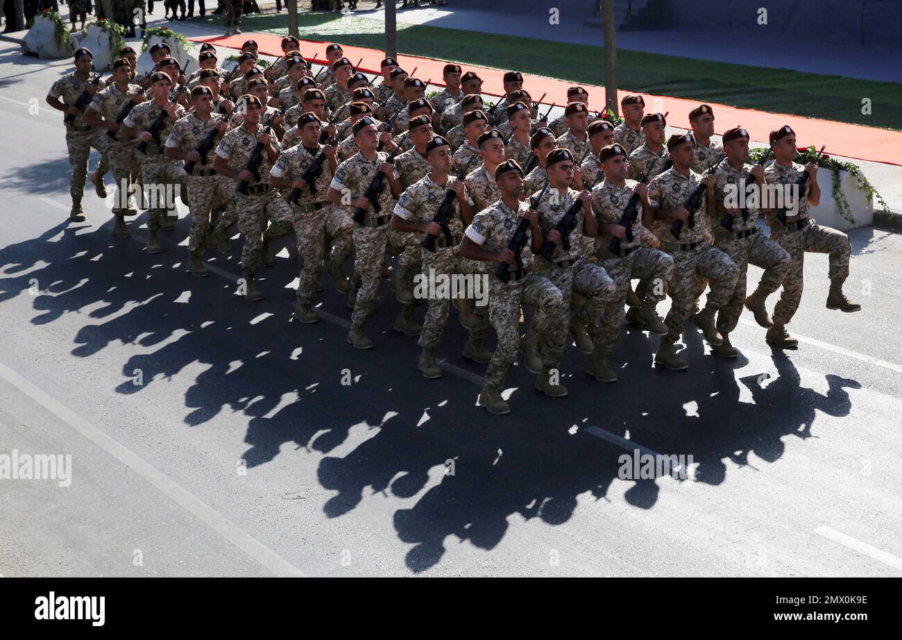 Lebanese army soldiers march during a military parade to mark the 73rd ...