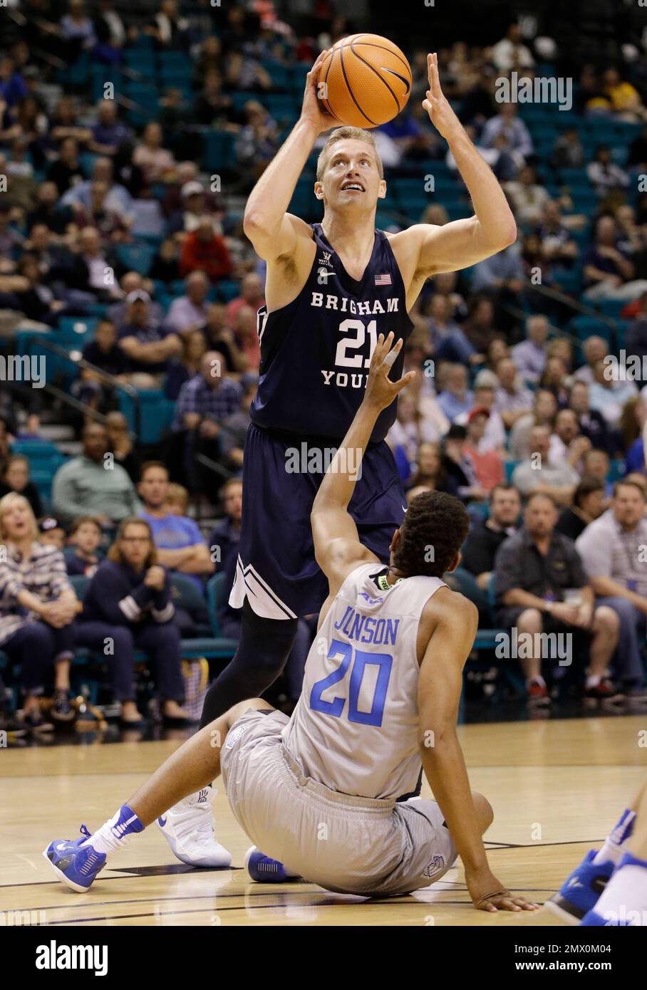BYU forward Kyle Davis shoots over Saint Louis forward Jalen Johnson ...