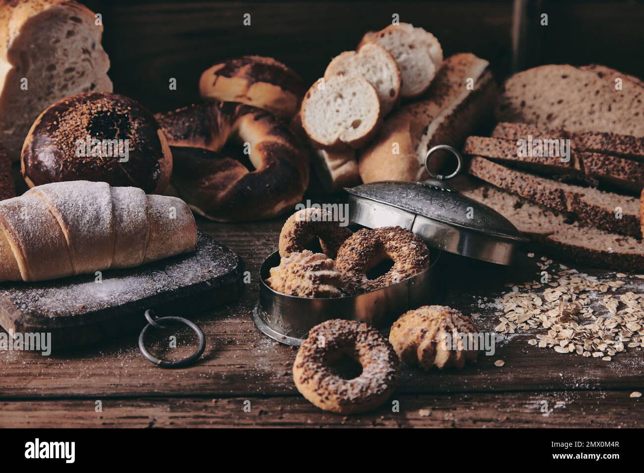 Assorted types of freshly baked buns and slices of Turkish bread served ...