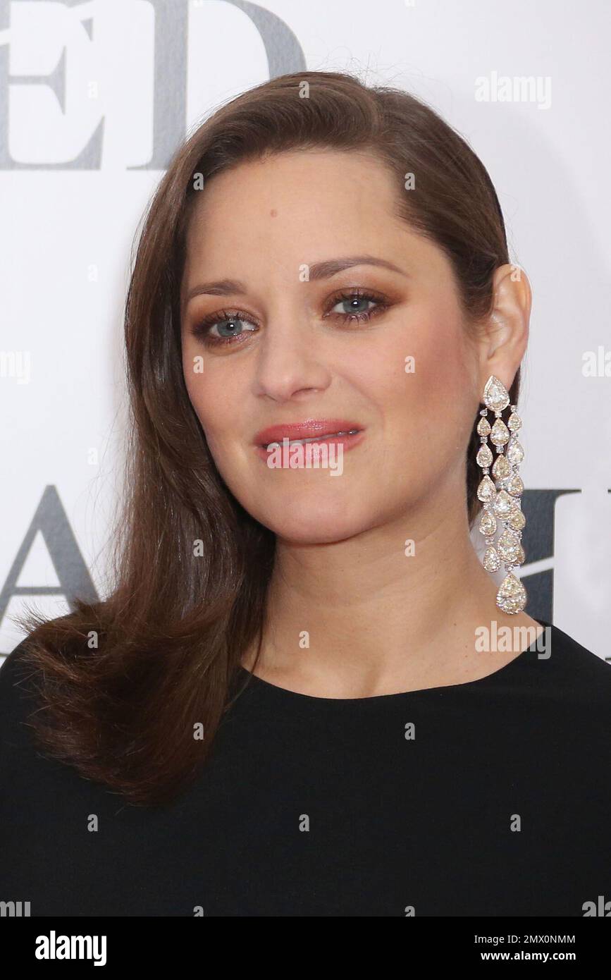 Actress Marion Cotillard poses for photographers upon arrival at the ...