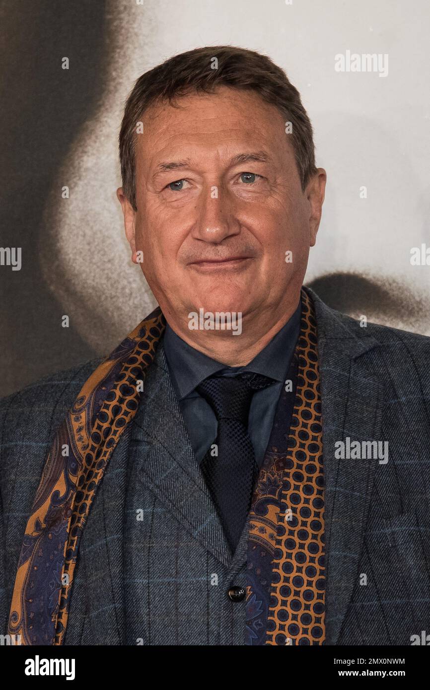 Steven Knight poses for photographers upon arrival at the premiere of ...