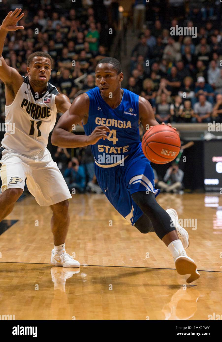 Georgia State guard Isaiah Dennis (4) drives the ball past Purdue guard ...